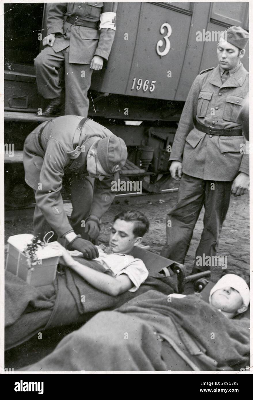 Wounded German soldiers are taken aboard Swedish hospital train Stock ...