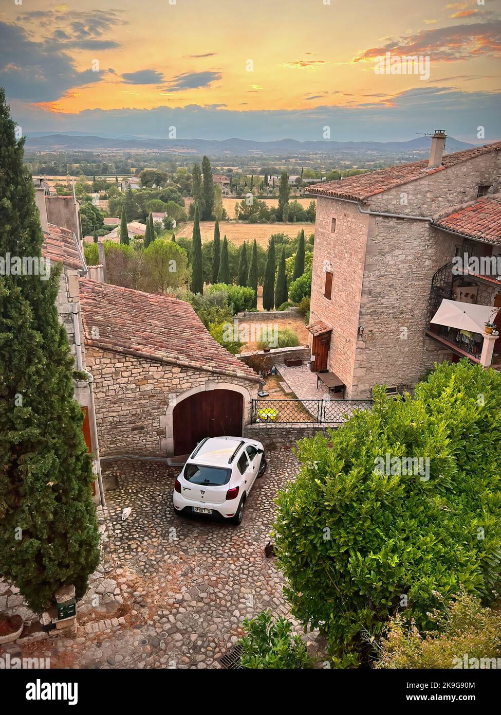 Vertical Mediterranean inland sunset evening scenary, with old houses ...