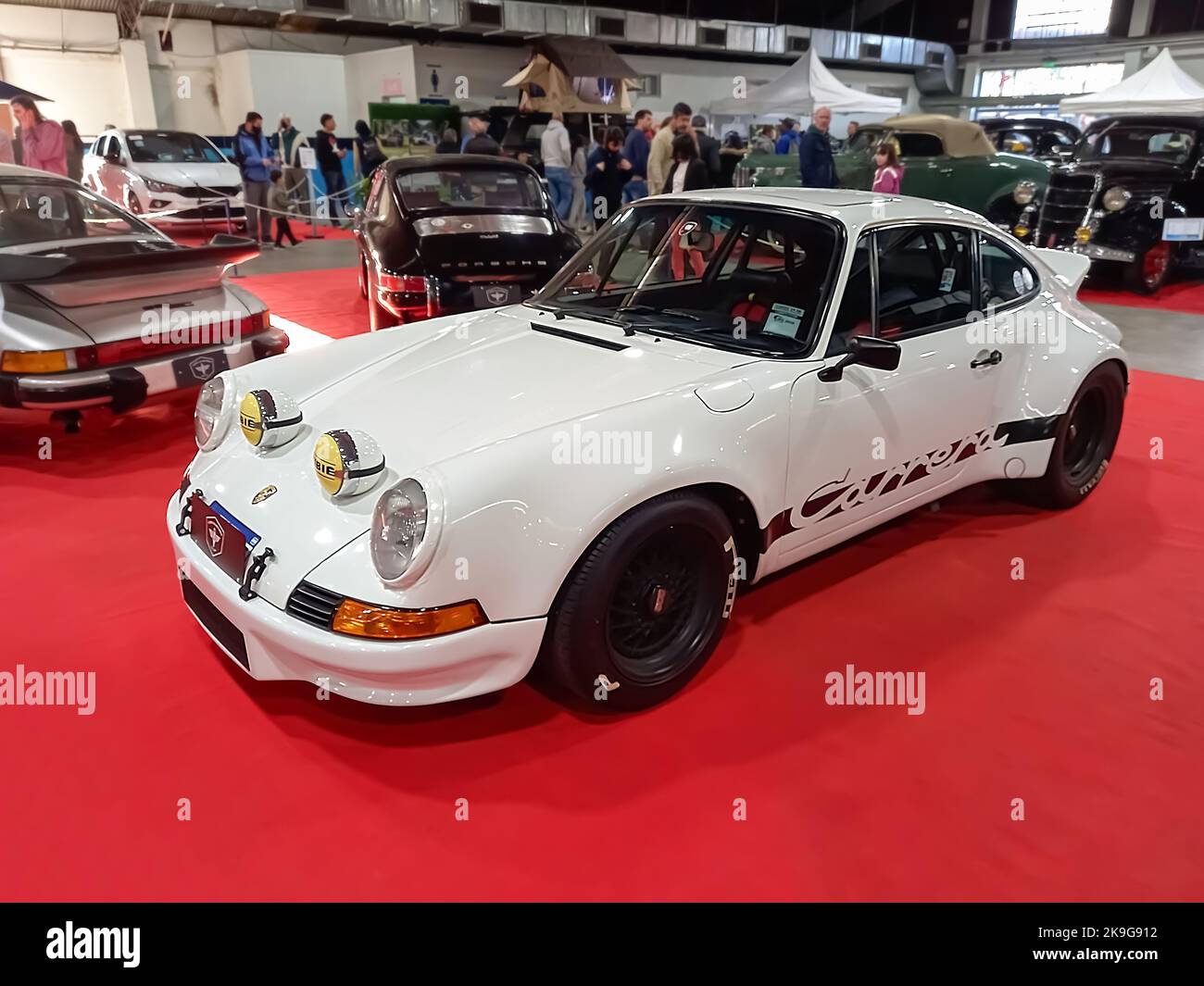 Old white sport 1973 Porsche 911 RSR Carrera speedster coupe on the red ...