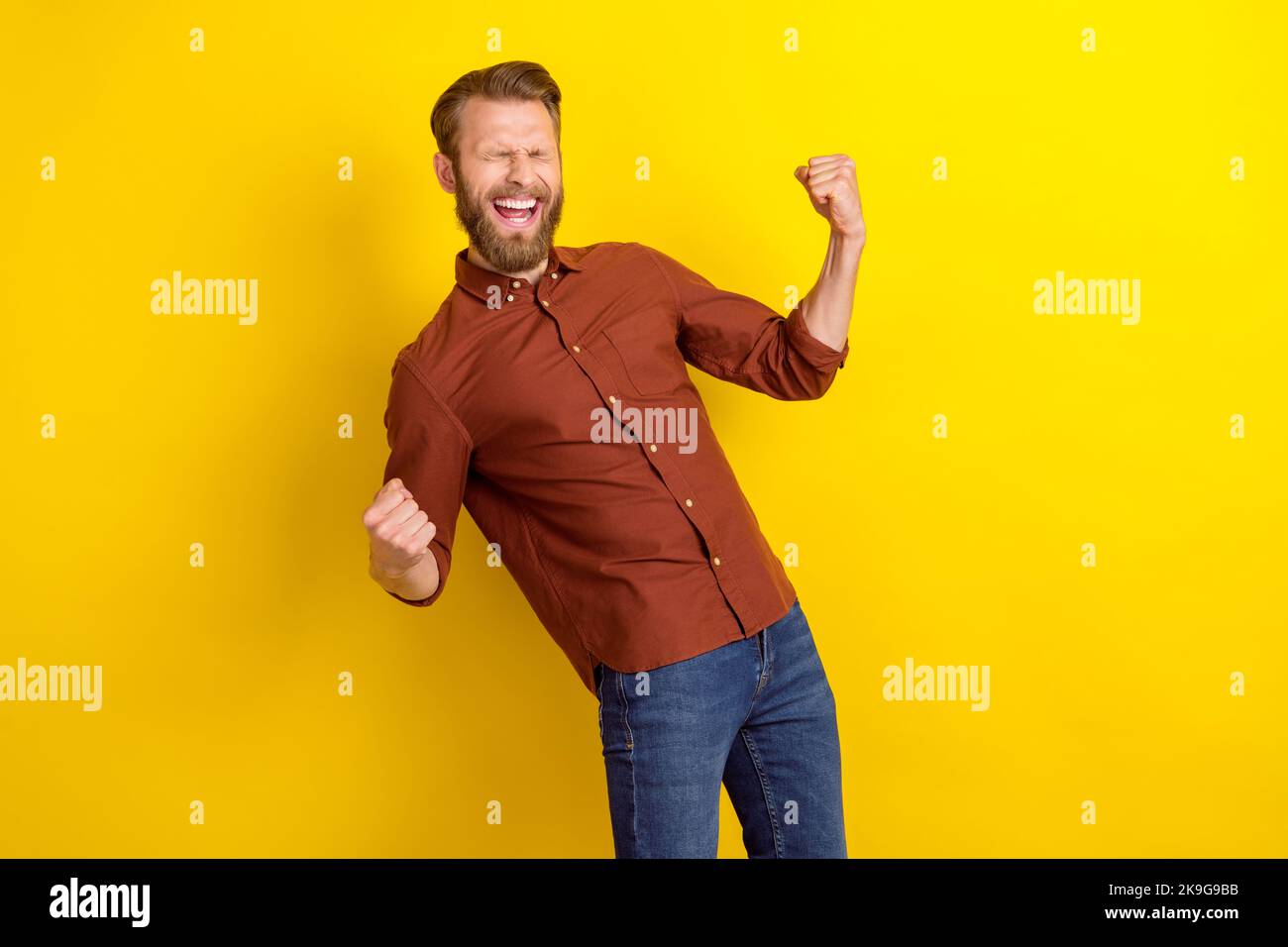 Photo of overjoyed positive man raise fists shout yes hooray ...