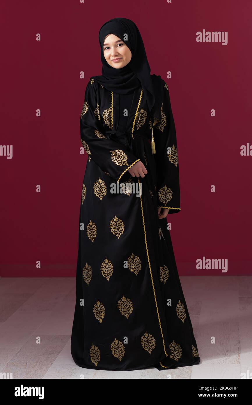 beautiful muslim woman in fashinable dress with hijab isolated on ...