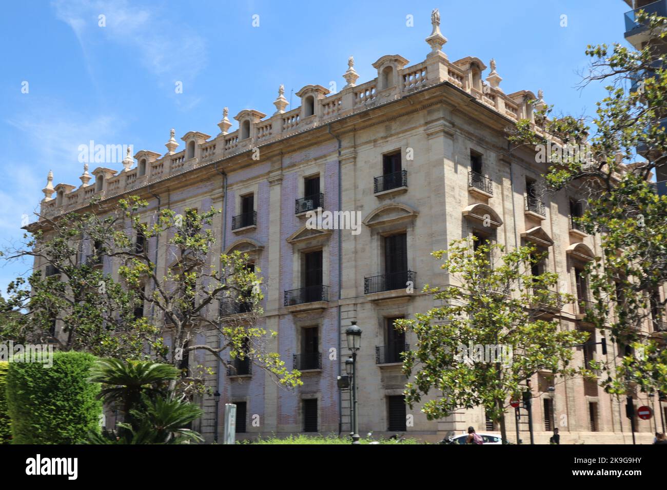 old and beautiful Spanish building in the middle of greens Stock Photo ...