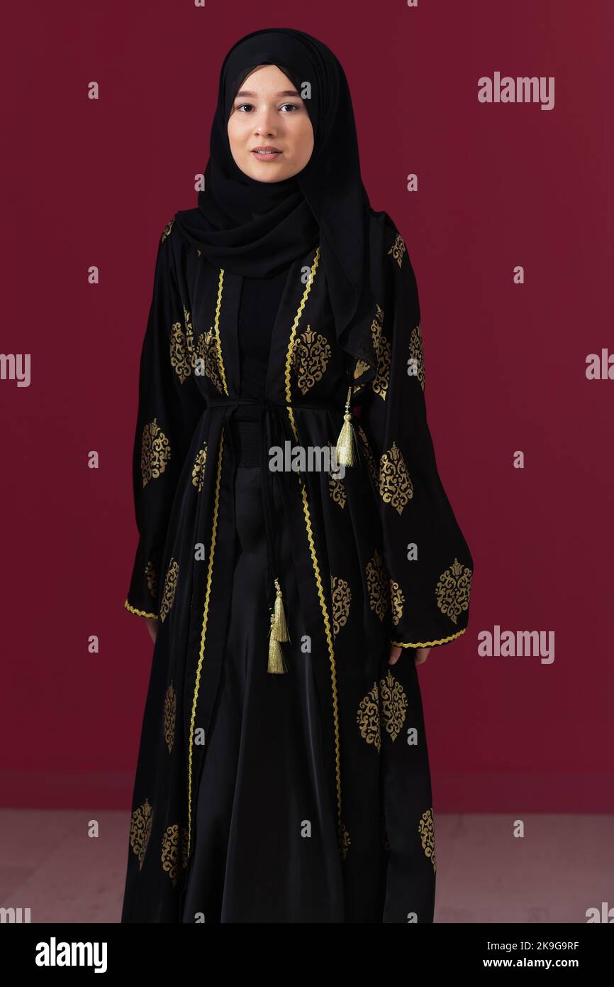 beautiful muslim woman in fashinable dress with hijab isolated on ...