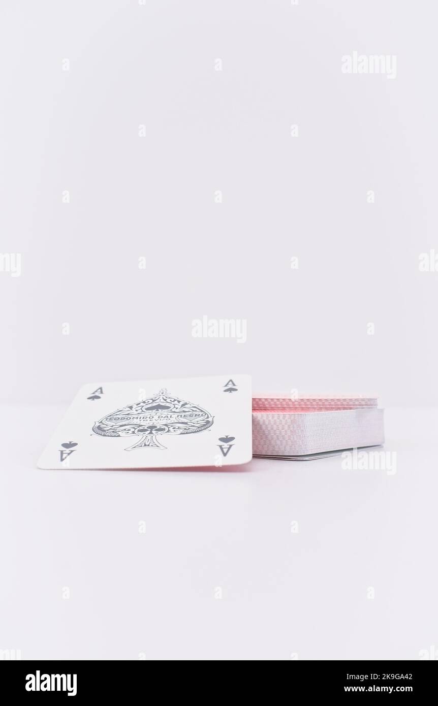 poker playing cards and ace of cards on a white table with space for ...