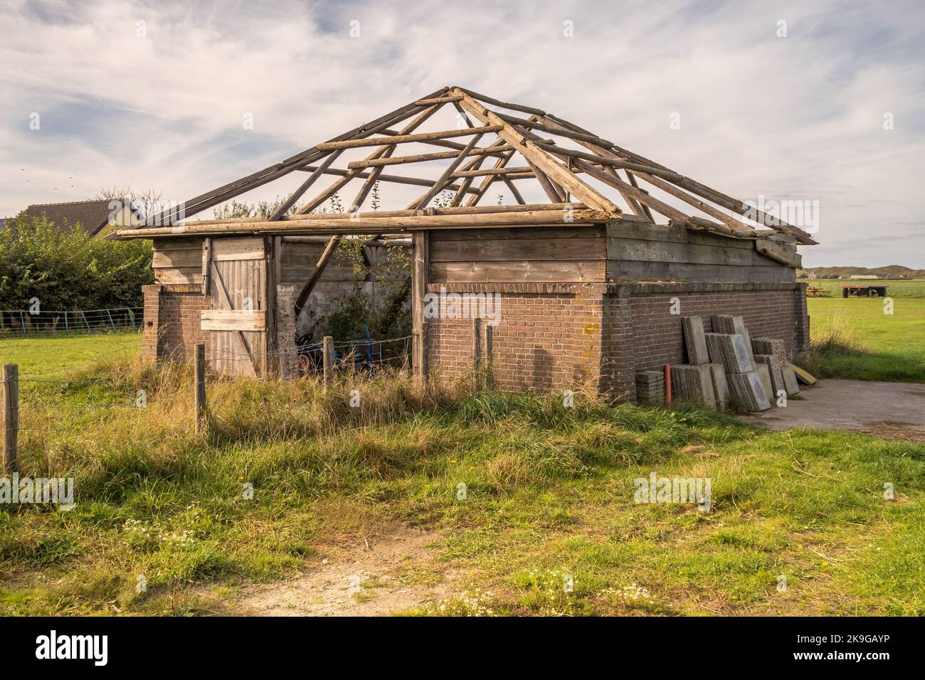 Texel, Netherlands. October 2022,. An old, half collapsed barn on Texel ...