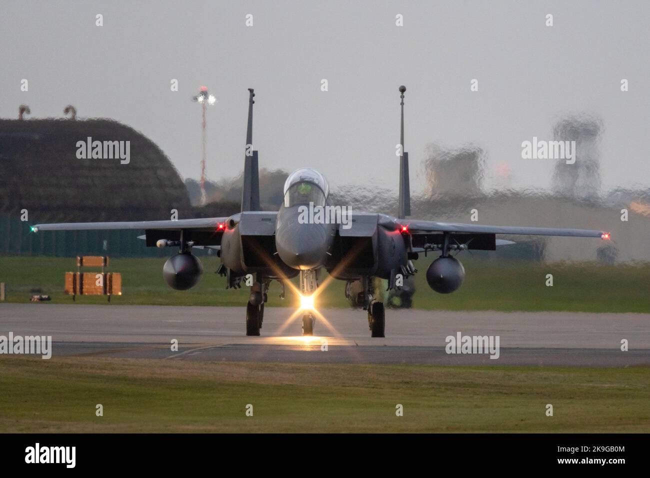 F-15E Strike Eagle taxiing for takeoff at sunrise, RAF Lakenheath ...