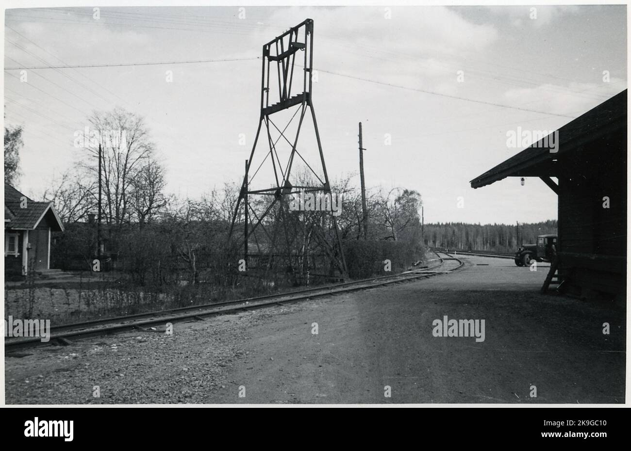 Power line post at a loading area Stock Photo - Alamy