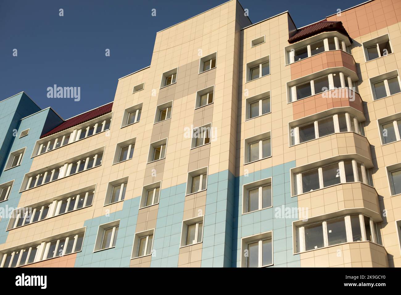 Building is under construction. New house in city. Windows in ...