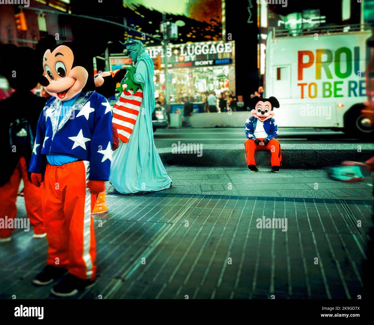 A beautiful shot of Times Square full of colorful Disney characters ...