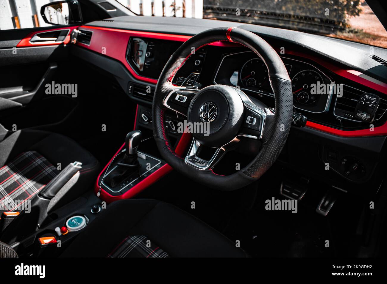 The high-angle view of the interior of a red Volkswagen polo car Stock ...