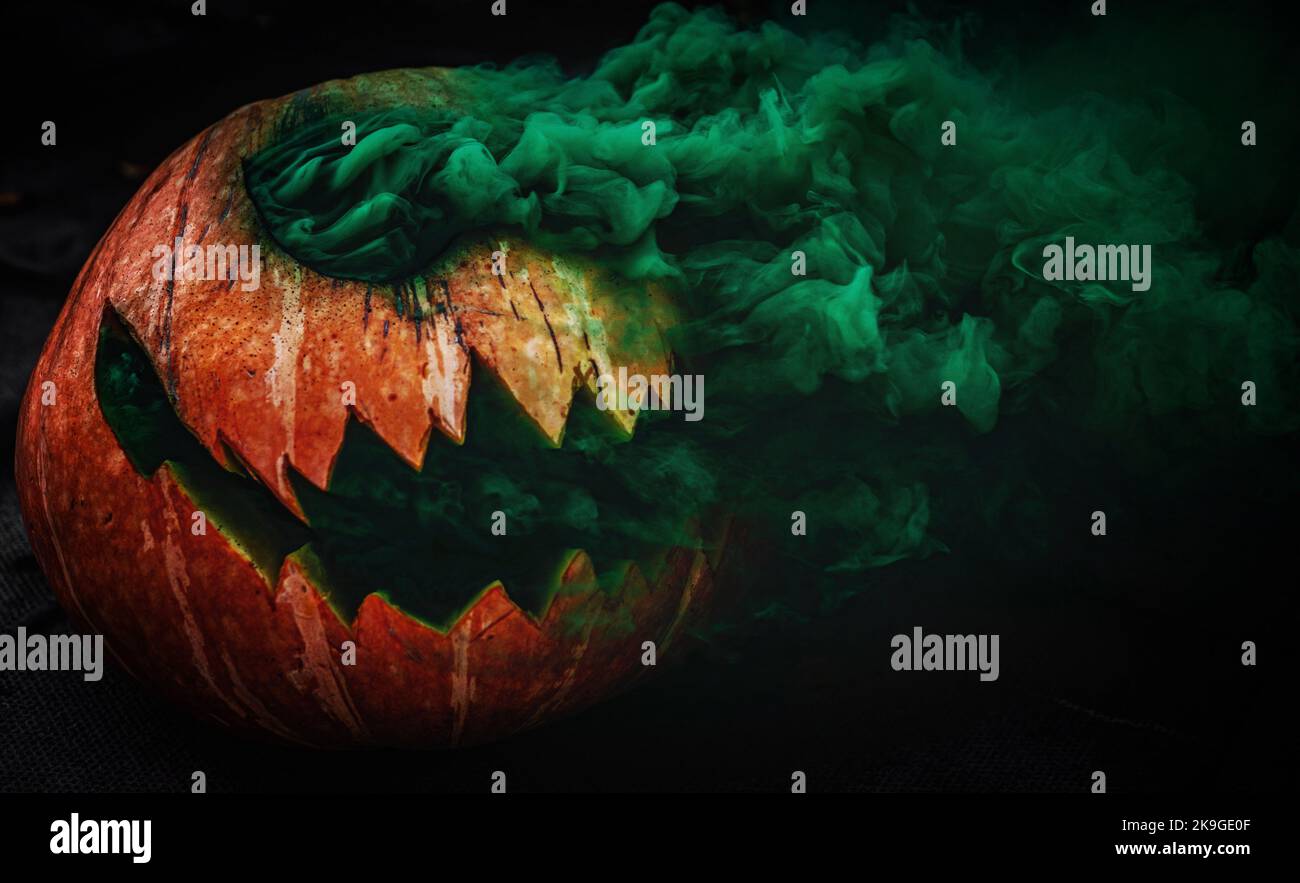Halloween pumpkin smoke horror eyes hi-res stock photography and images ...