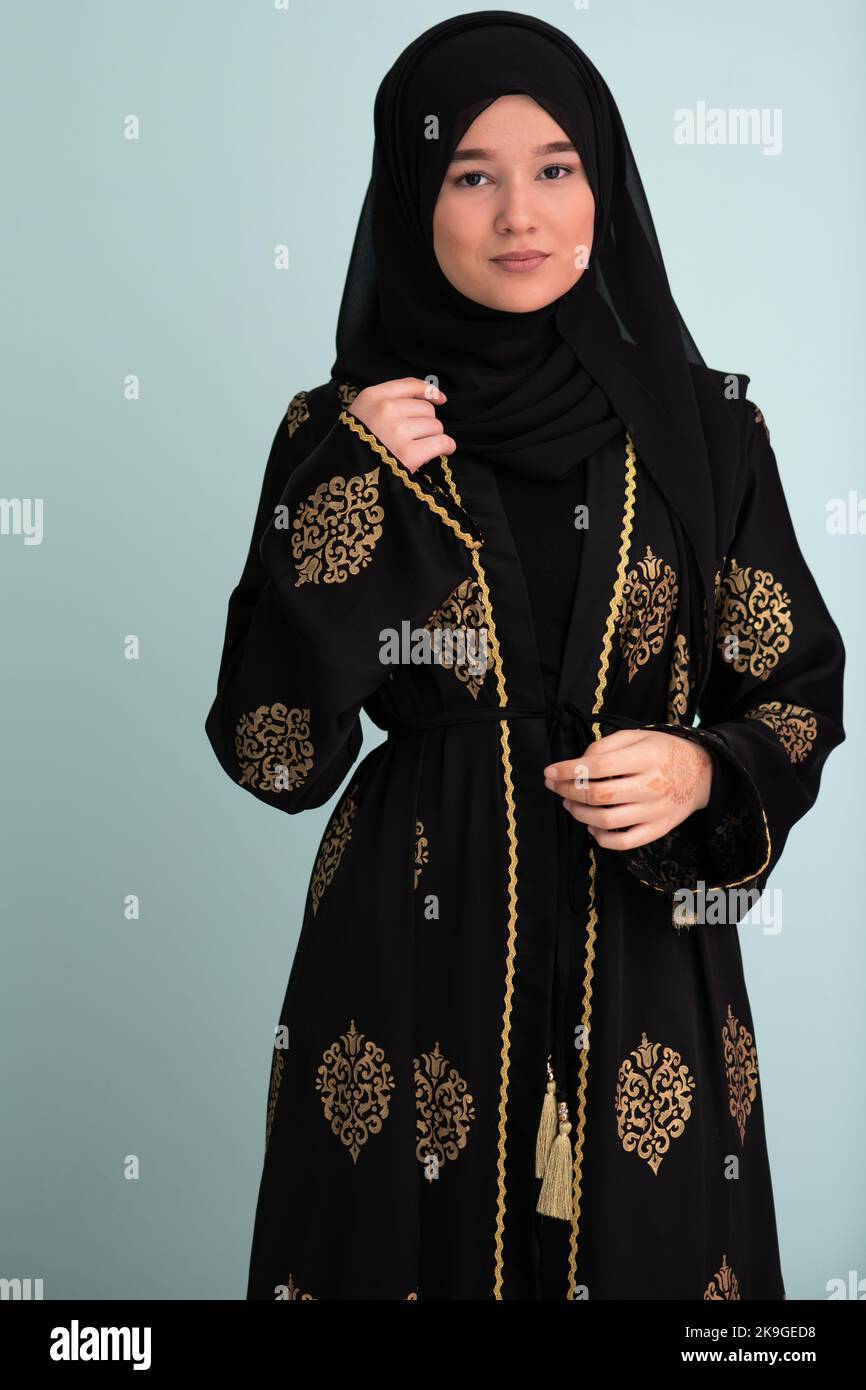 beautiful muslim woman in fashinable dress with hijab isolated on ...