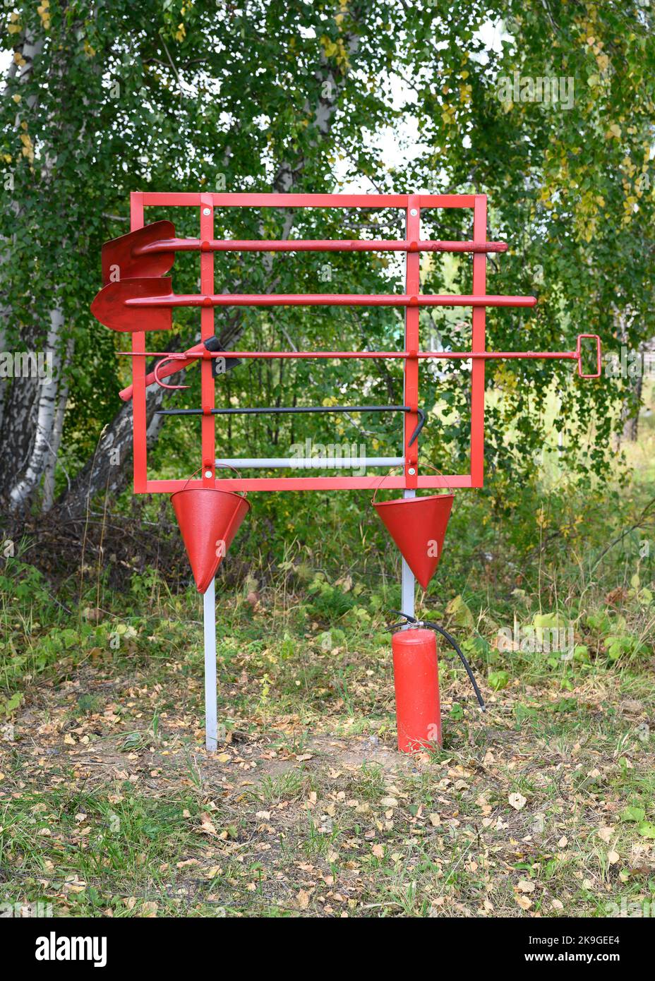 Tools for extinguishing a fire in a summer forest: a fire extinguisher ...