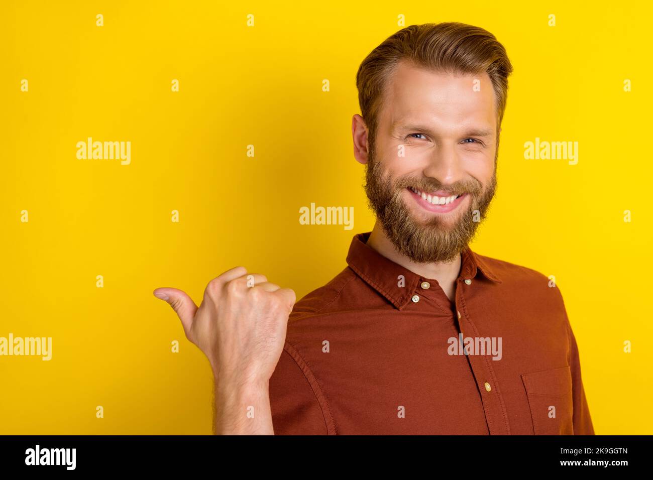 Portrait of cunning tricky funny man with masculine beard wear burgundy ...