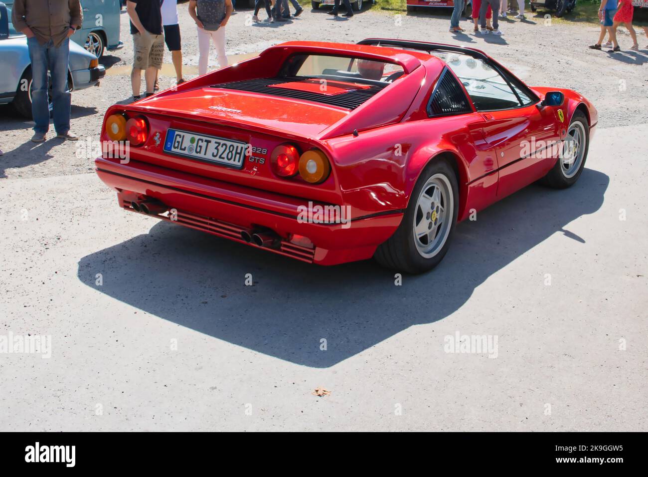 red Ferrari 328 GTS classic car, diagonally rear view Stock Photo - Alamy