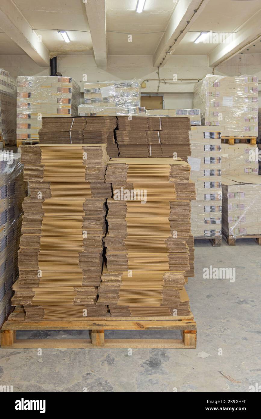 Cardboard Boxes Packaging Stacks at Pallet in Warehouse Stock Photo - Alamy