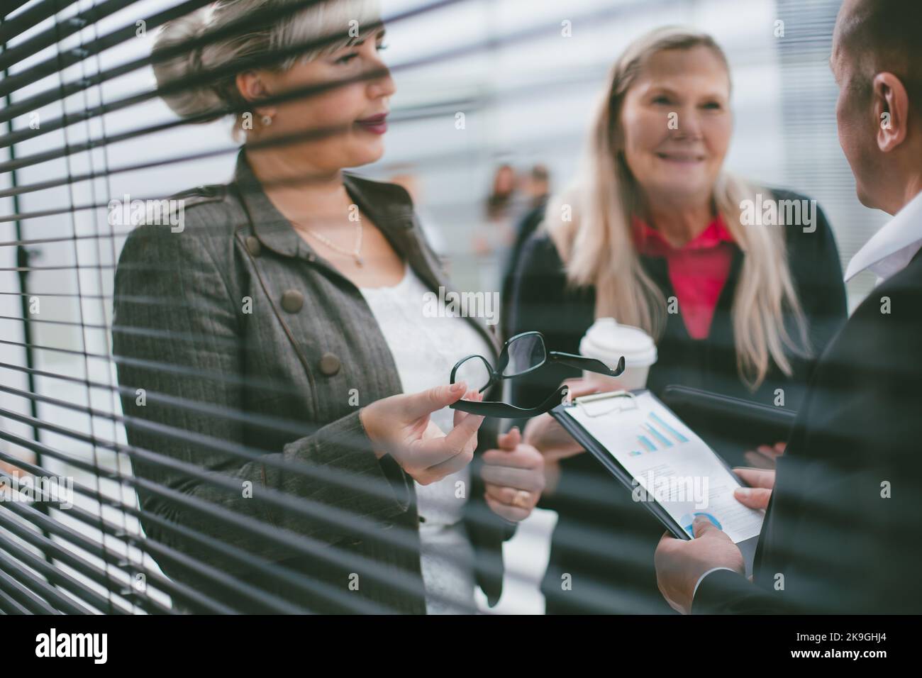 group of competent employees discussing business documents. office ...