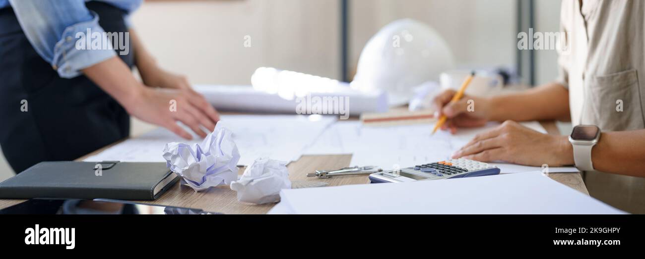 Engineering construction concept, Two female engineers discussing about ...