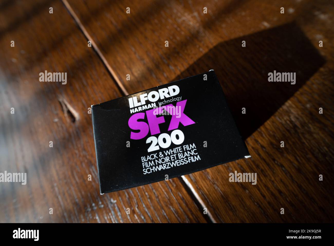 The box of 35mm film for Analog Photo Cameras on wooden table Stock ...