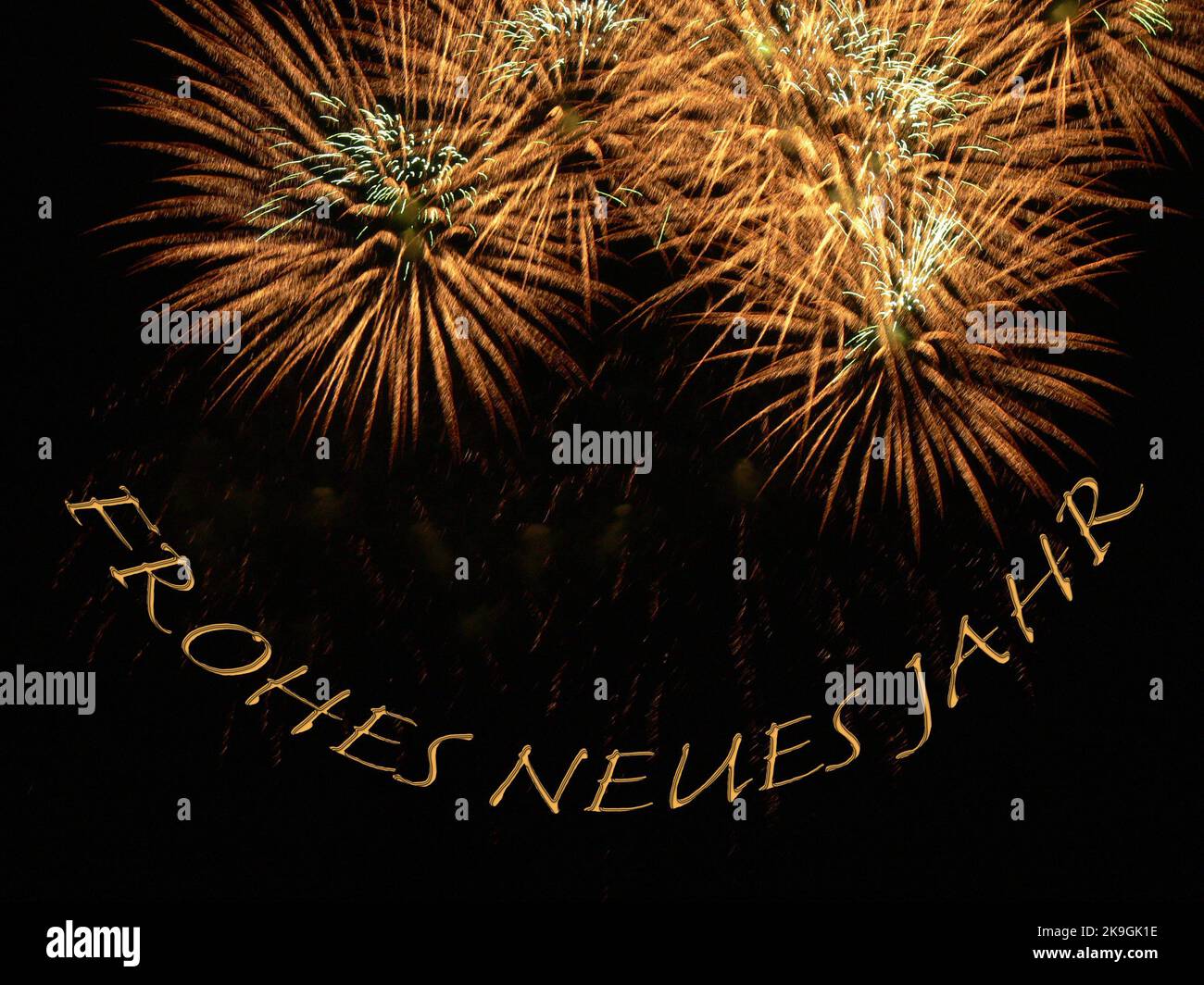 Fireworks in the black night sky, German writing Stock Photo - Alamy