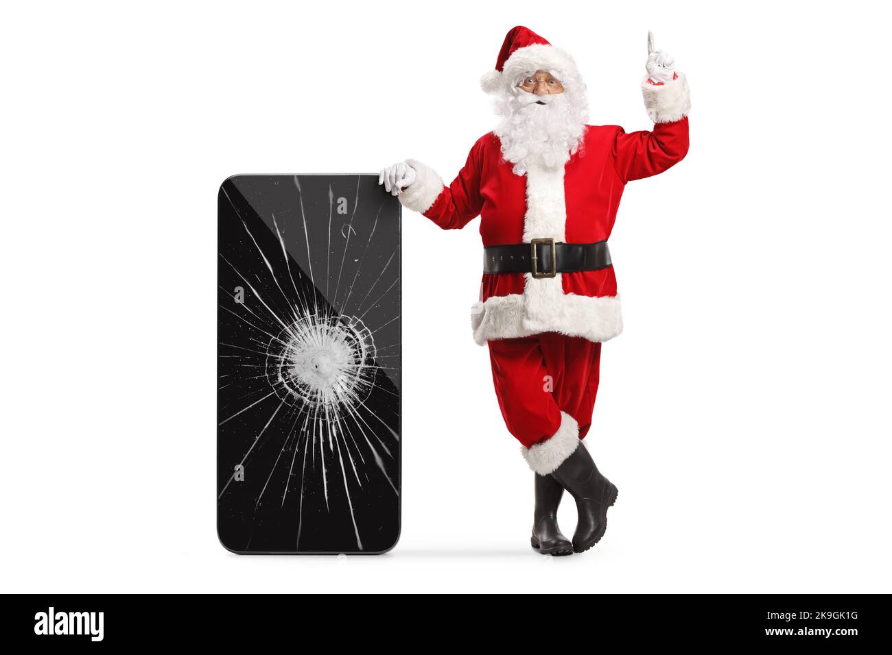 Santa claus leaning on a mobile phone with cracked screen and pointing ...