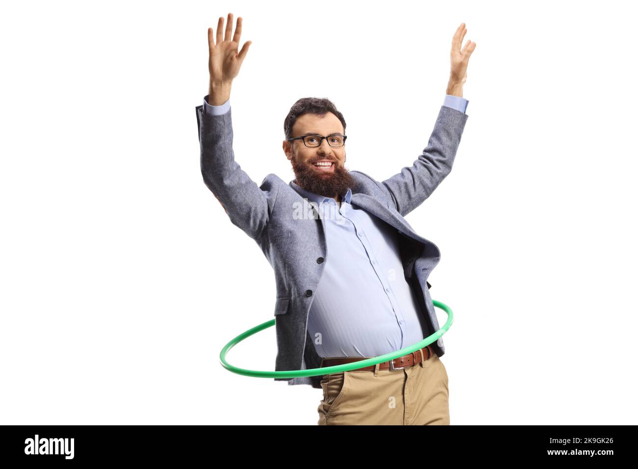 Happy bearded man spinning a hula hoop and smiling isolated on white ...