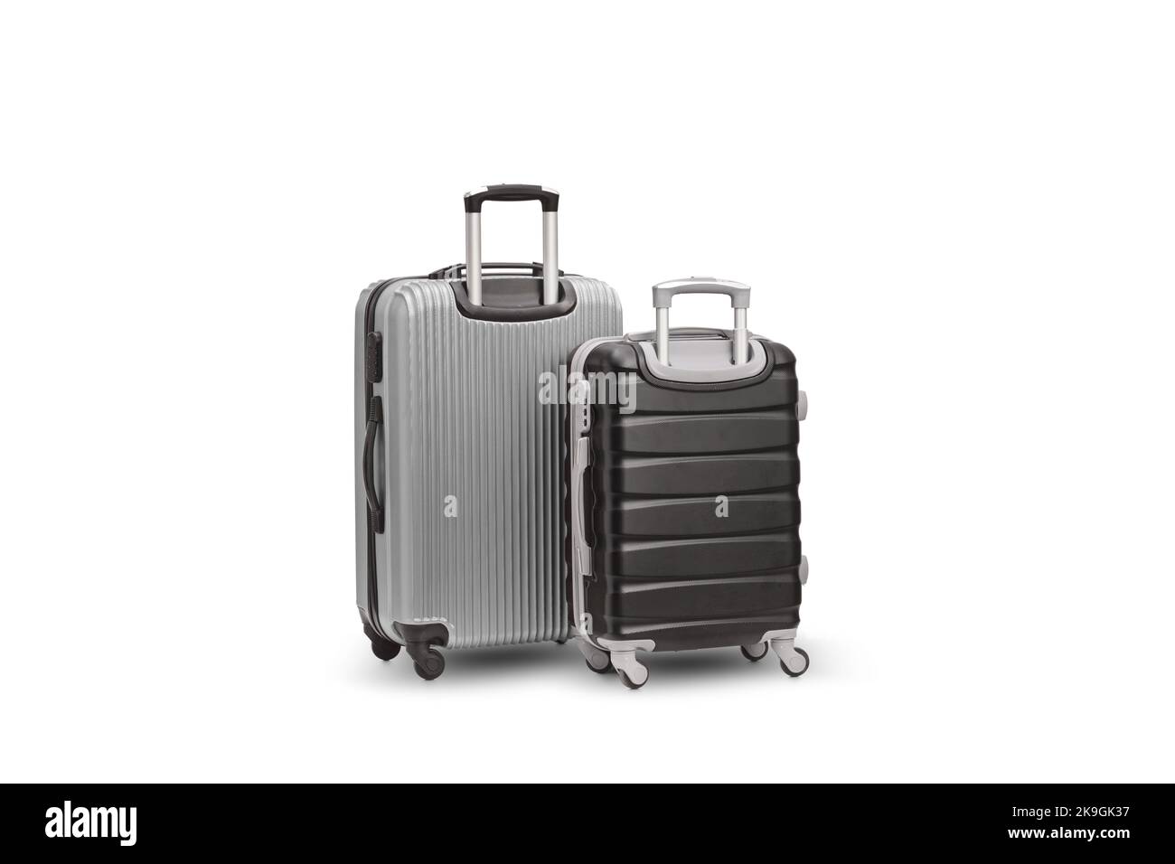Studio shot of two suitcases with wheels isolated on white background ...