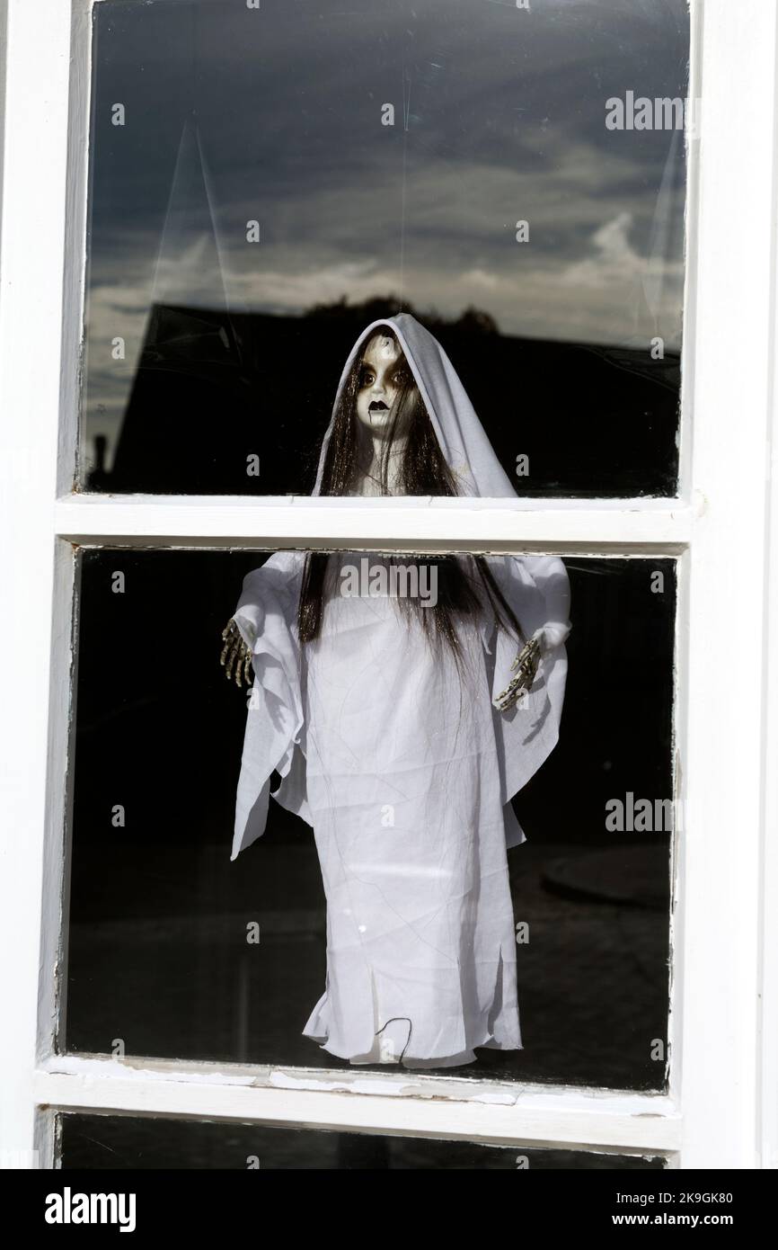 Halloween figure in a window, UK Stock Photo - Alamy