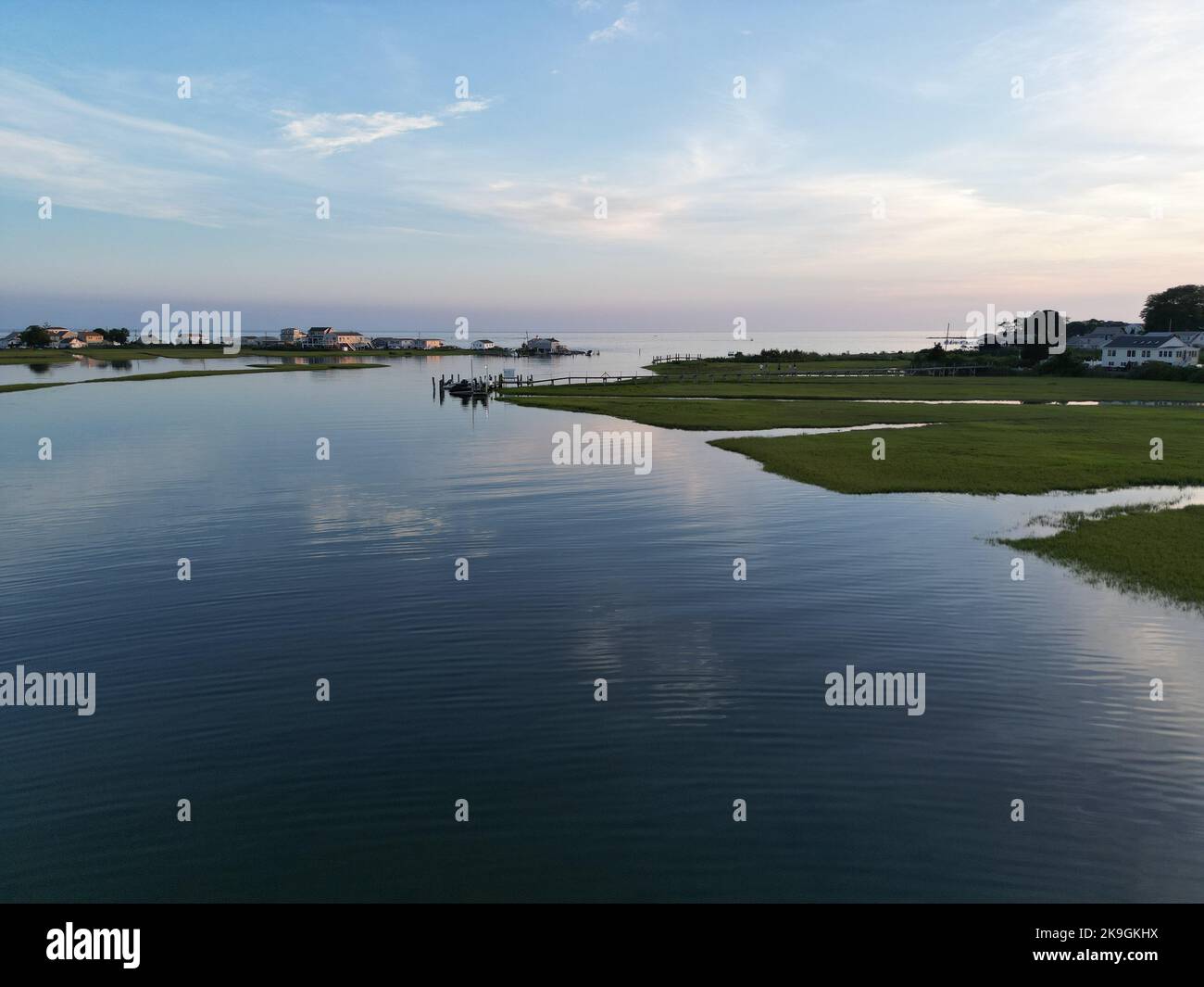 A scenic view of a calm day at the Beach and inlet shots in Old ...