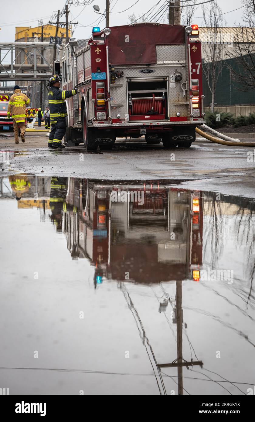 A group of firefighters at an industrial fire Stock Photo - Alamy