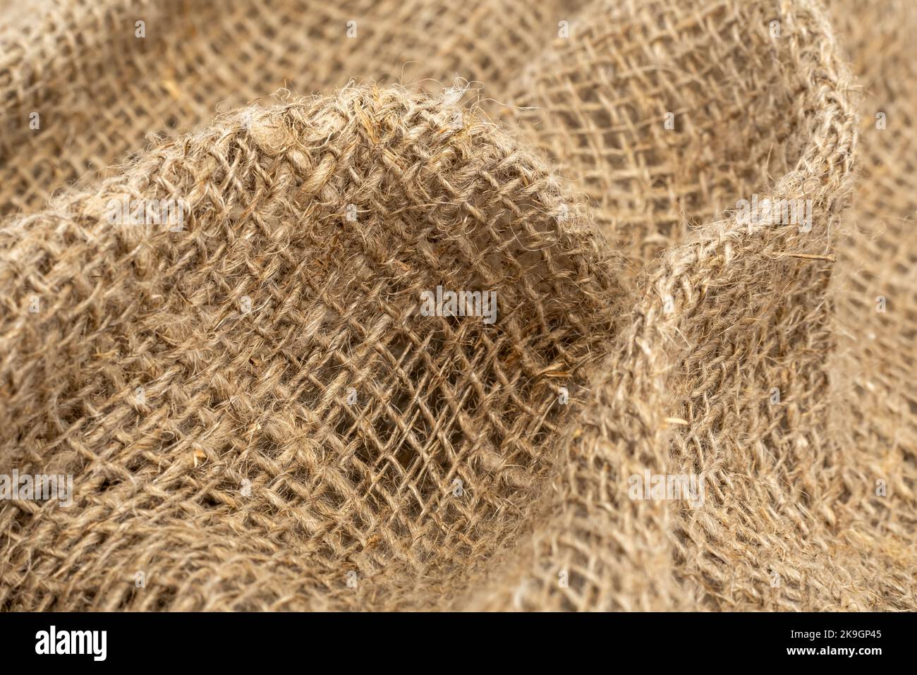 Burlap texture. Burlap fabric background with waves, folds and bruises ...