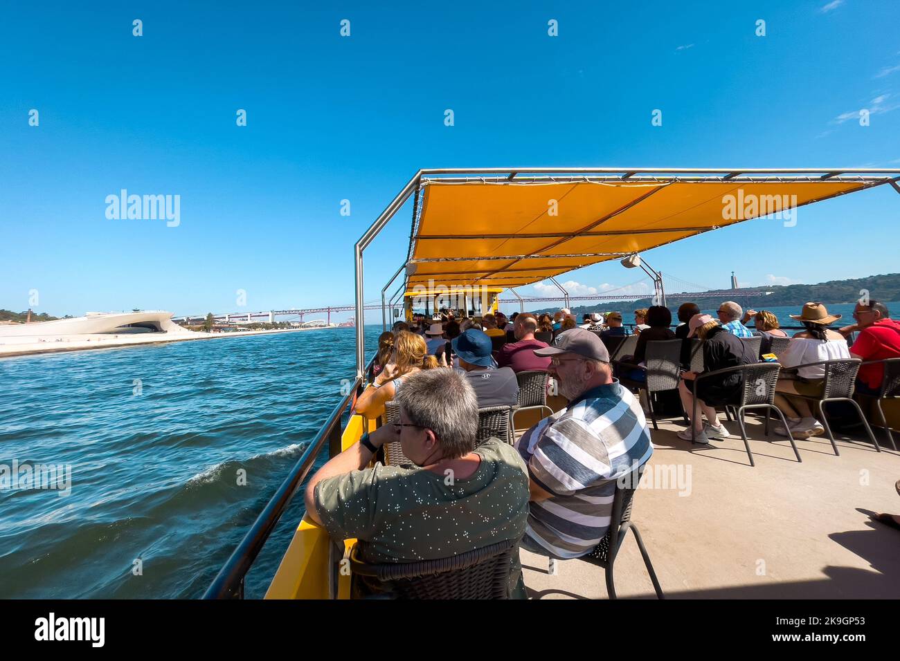 Group of tourists taking a ride on a tour boat Stock Photo - Alamy