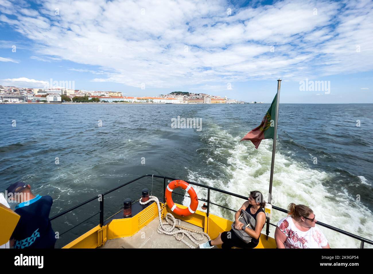 Group of tourists taking a ride on a tour boat Stock Photo - Alamy