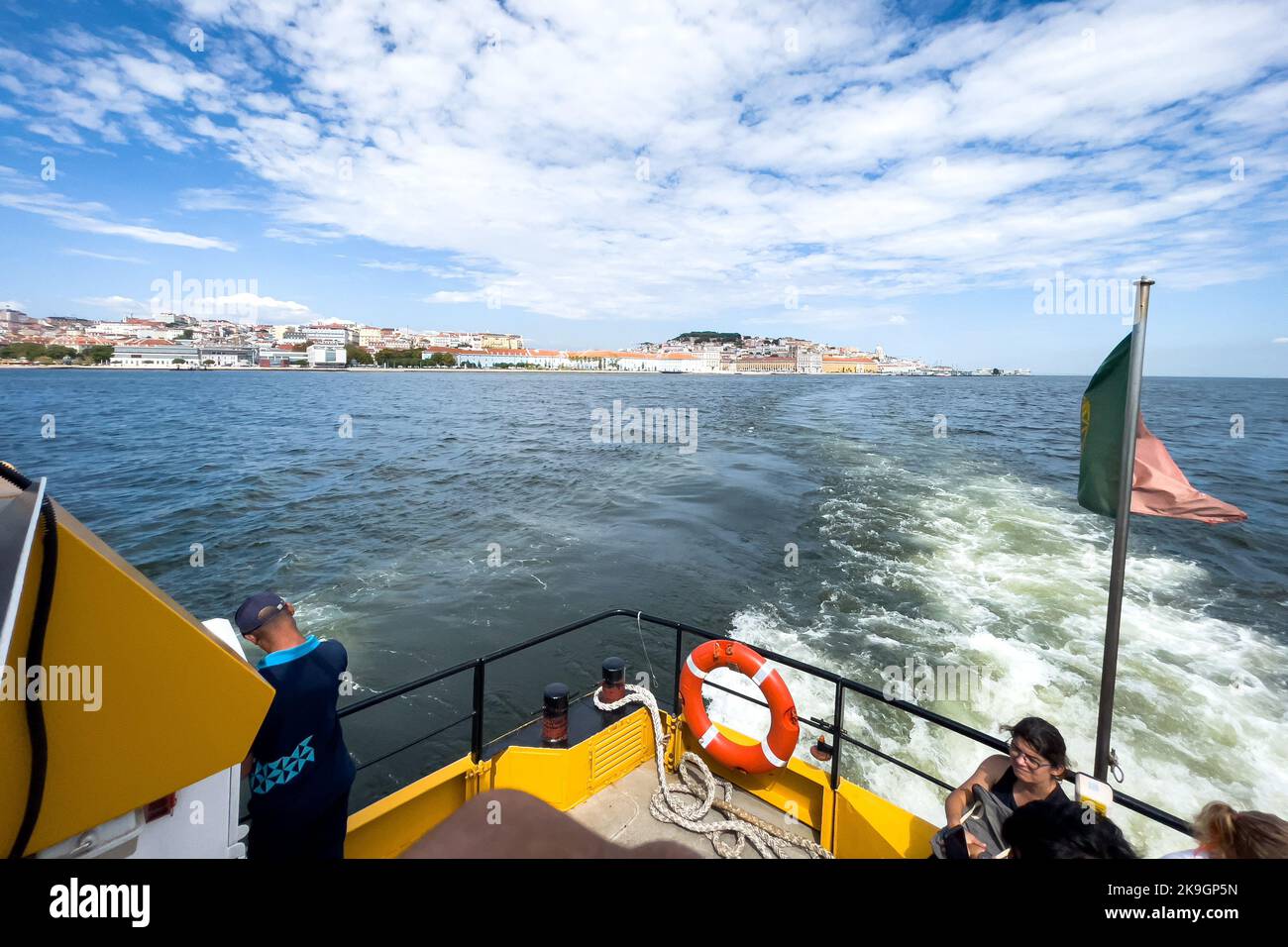 Group of tourists taking a ride on a tour boat Stock Photo - Alamy