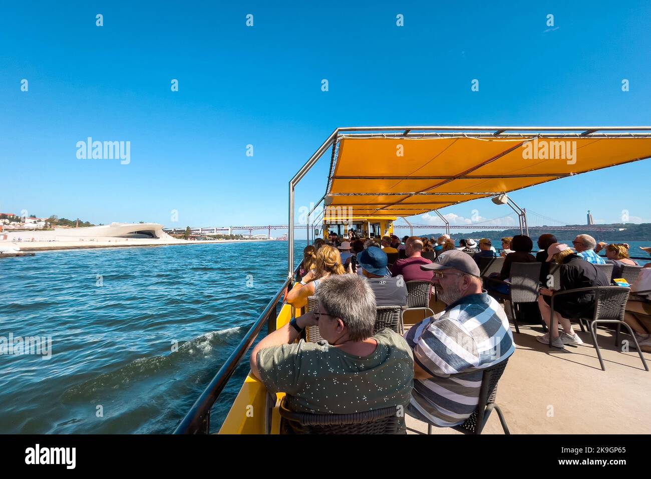 Group of tourists taking a ride on a tour boat Stock Photo - Alamy