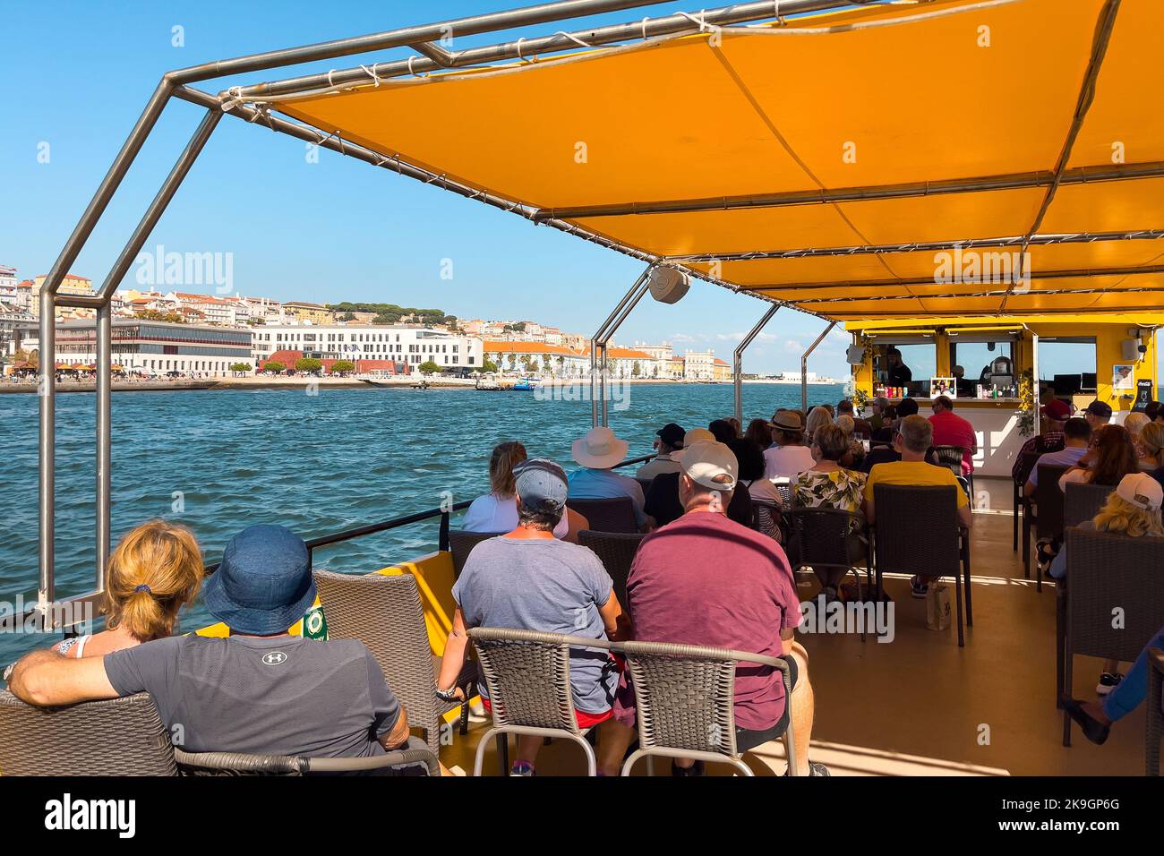 Group of tourists taking a ride on a tour boat Stock Photo - Alamy