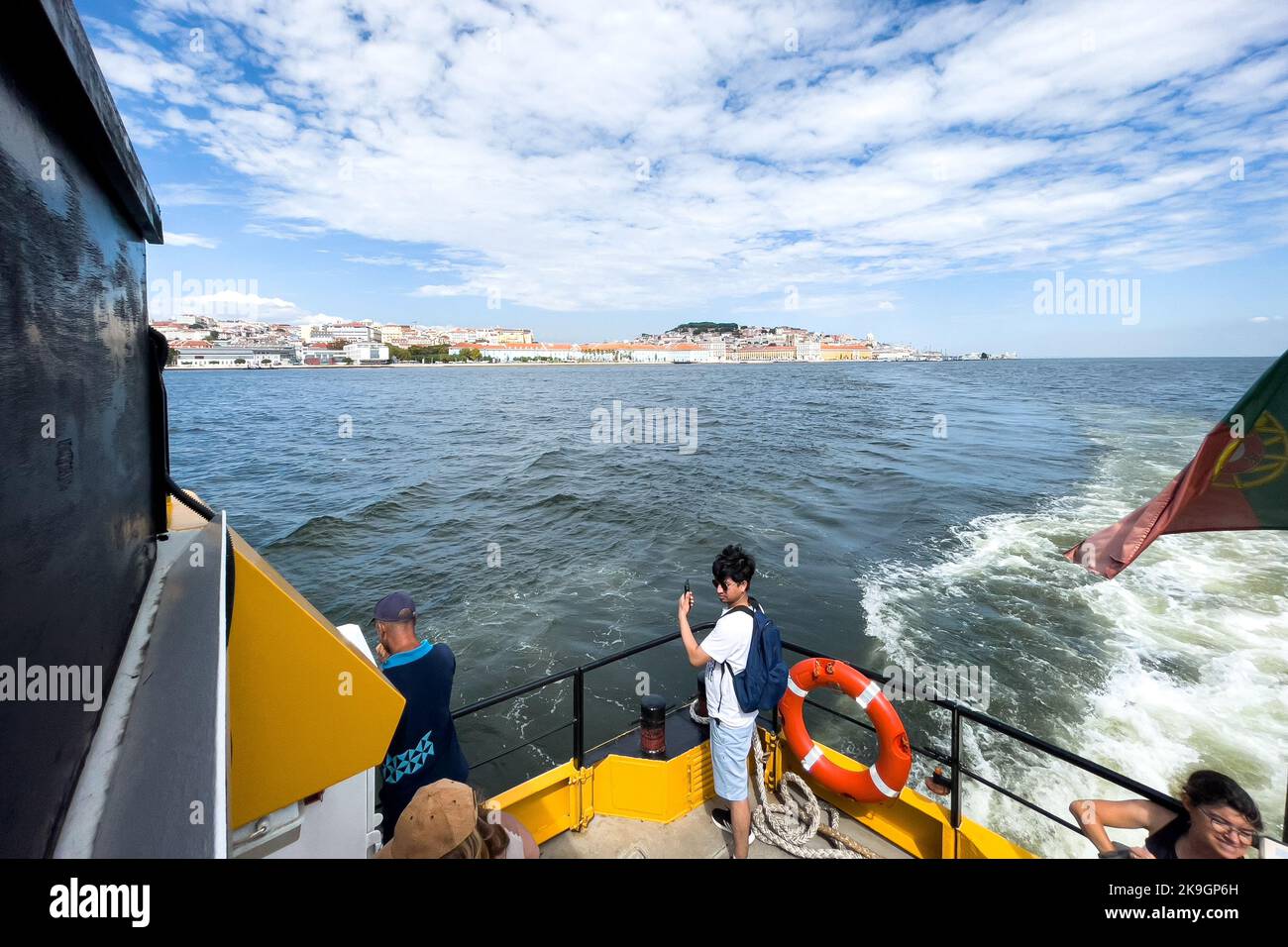 Group of tourists taking a ride on a tour boat Stock Photo - Alamy
