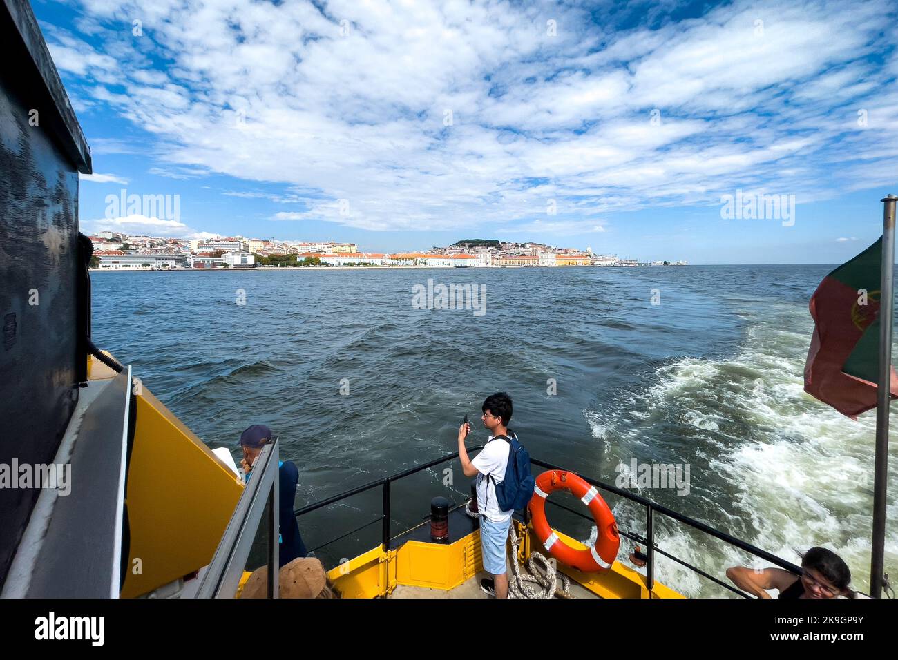 Group of tourists taking a ride on a tour boat Stock Photo - Alamy