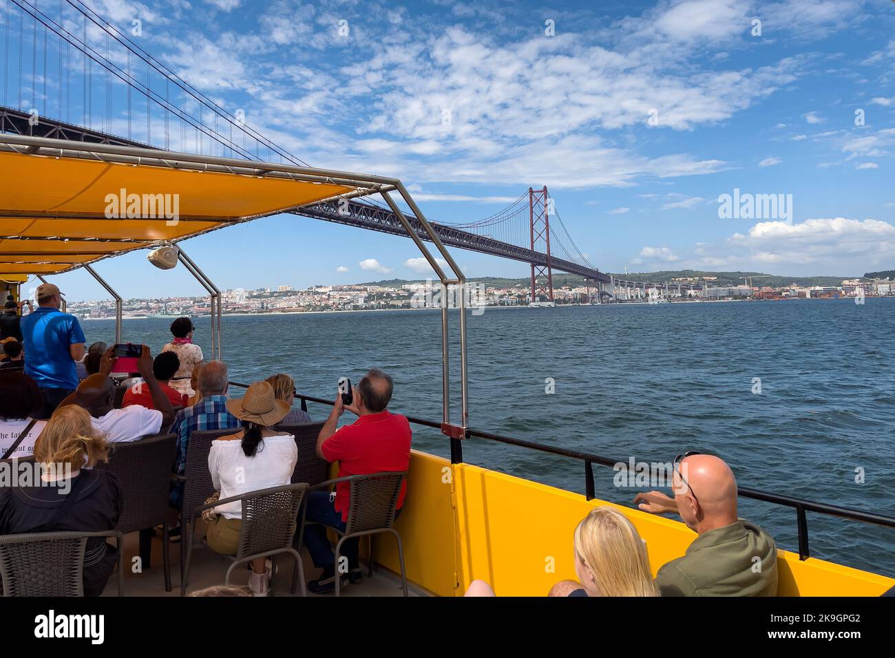 Group of tourists taking a ride on a tour boat Stock Photo - Alamy