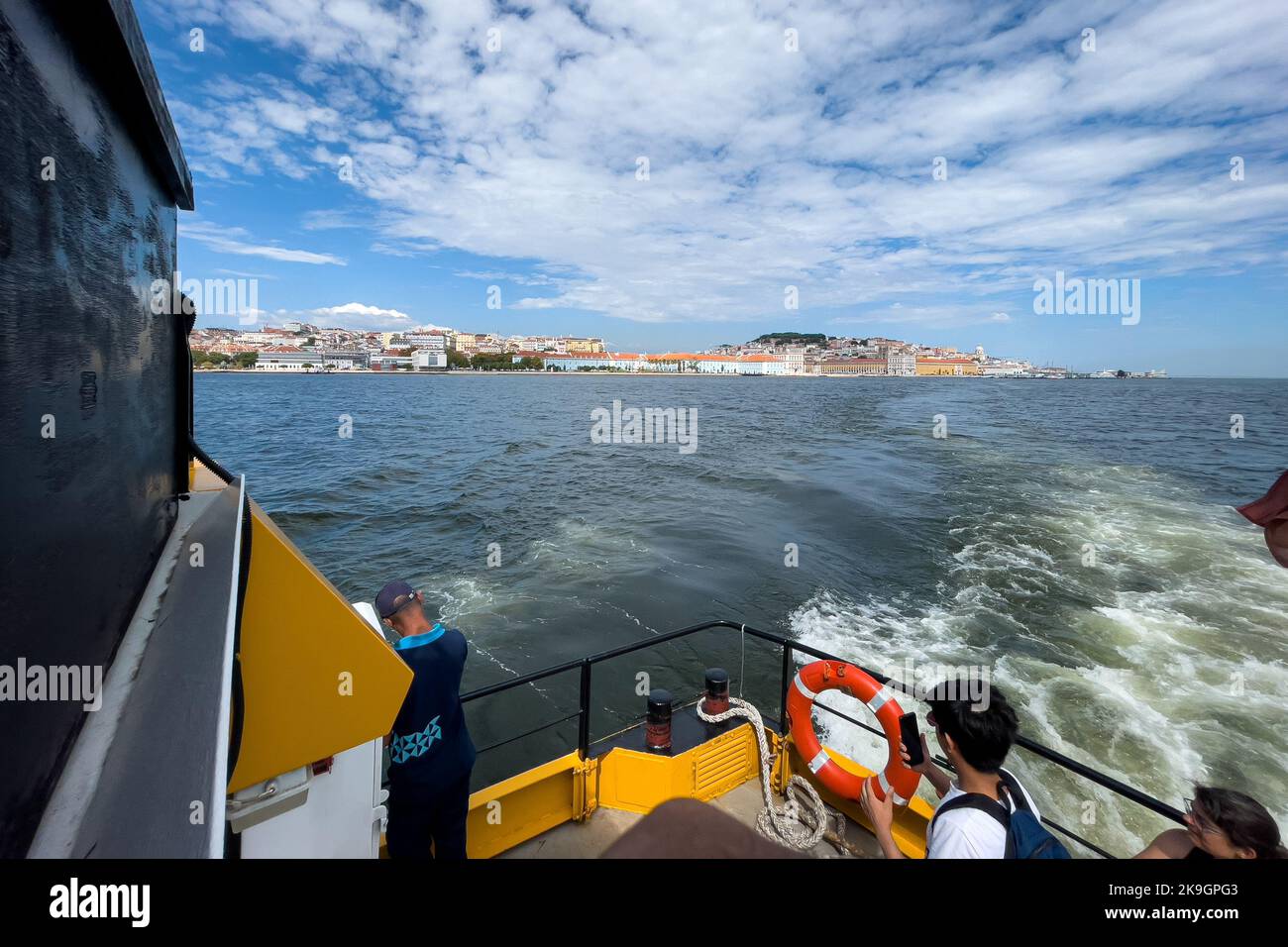 Group of tourists taking a ride on a tour boat Stock Photo - Alamy