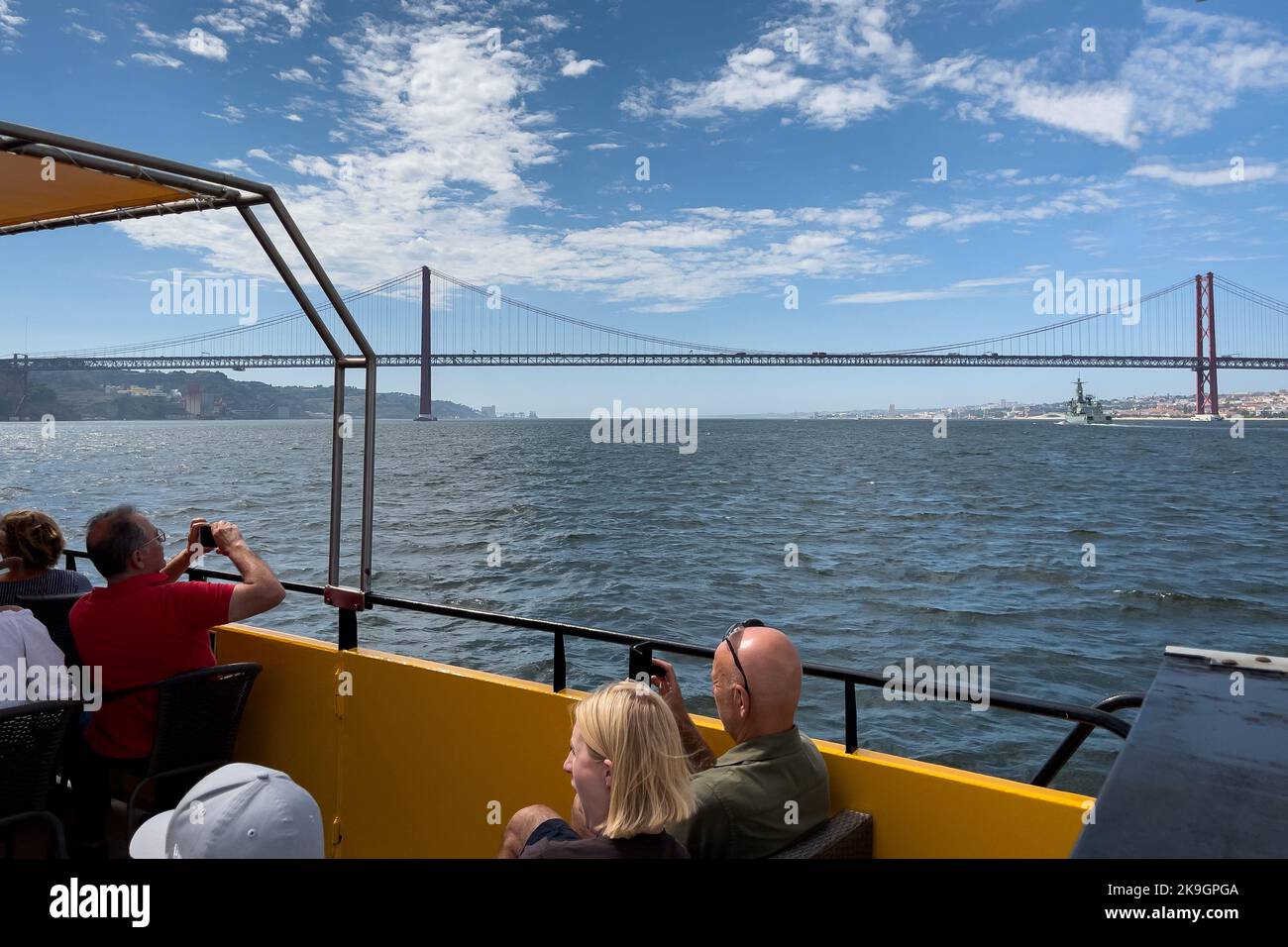 Group of tourists taking a ride on a tour boat Stock Photo - Alamy