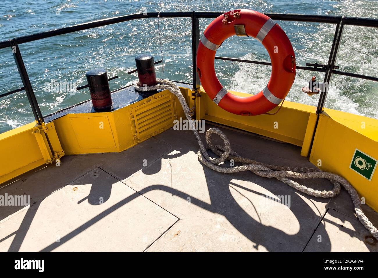 Orange rescue ring on a ferry boat Stock Photo - Alamy