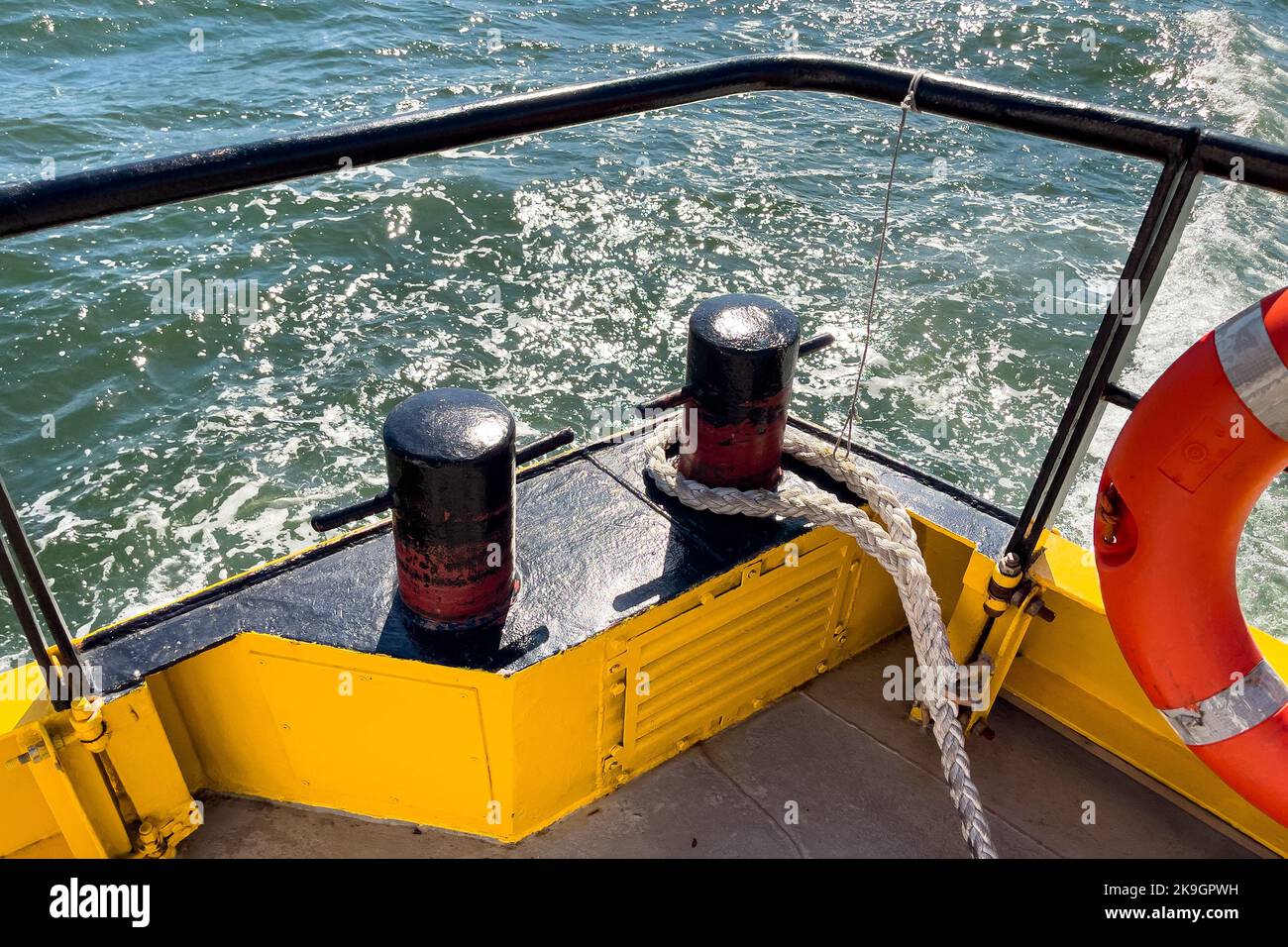 Orange rescue ring on a ferry boat Stock Photo - Alamy