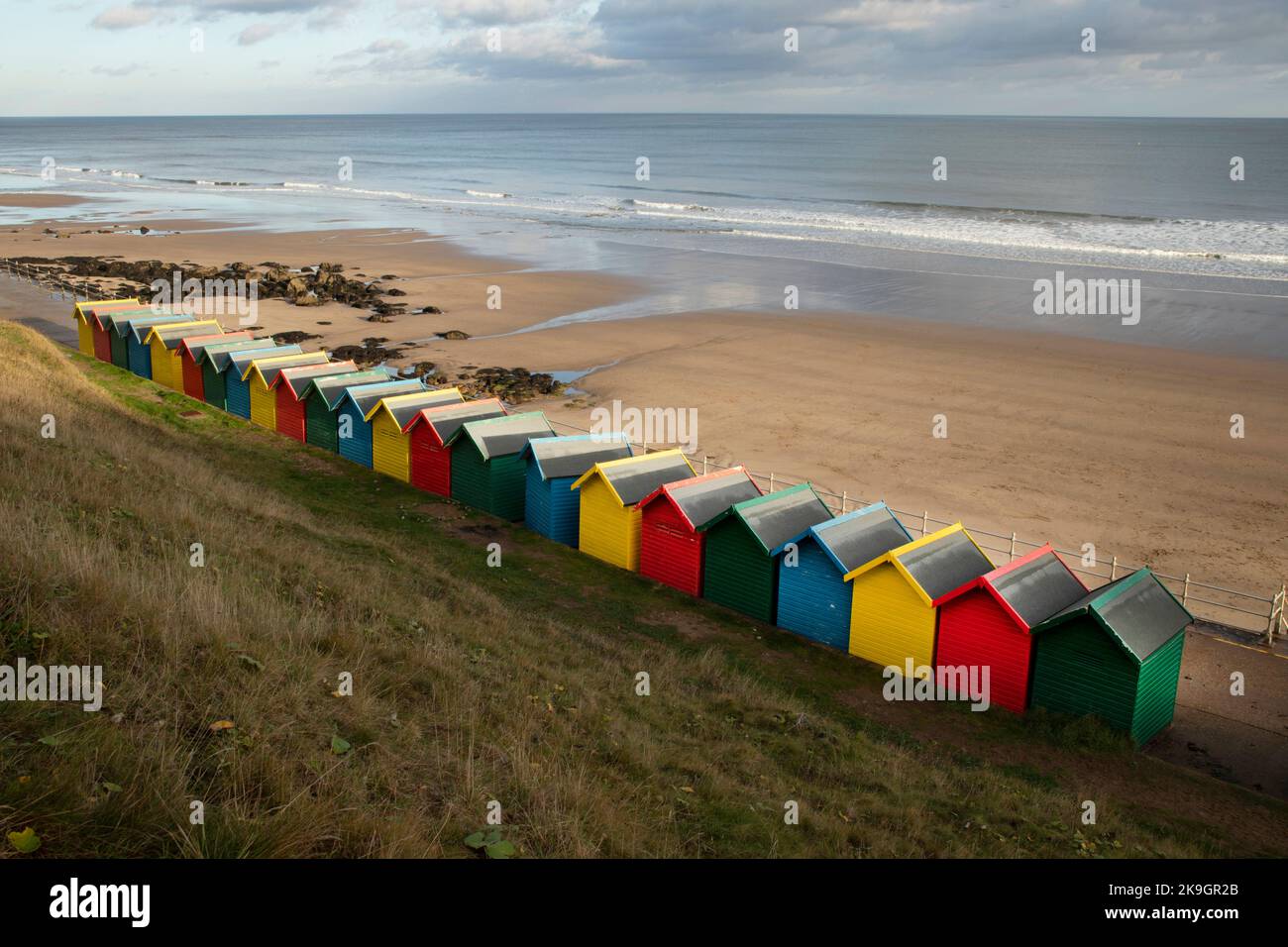 The coloured beach huts at Whitby Beach, North Yorkshire, 26th October ...