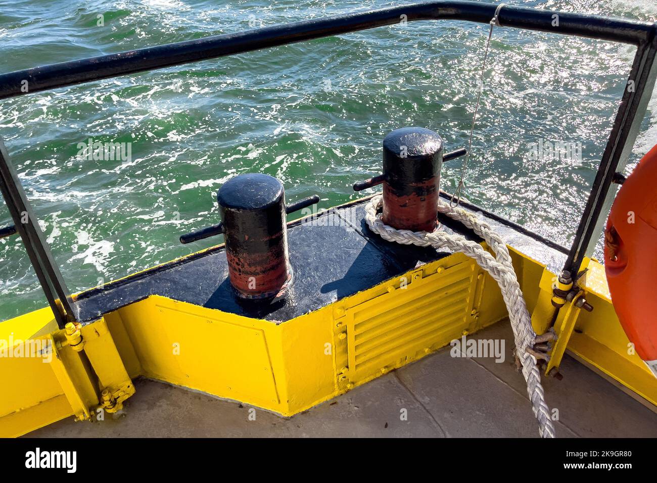 Orange rescue ring on a ferry boat Stock Photo - Alamy