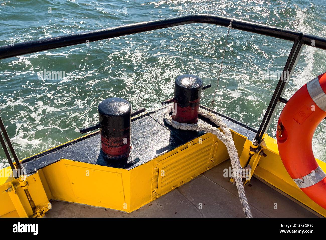 Orange rescue ring on a ferry boat Stock Photo - Alamy