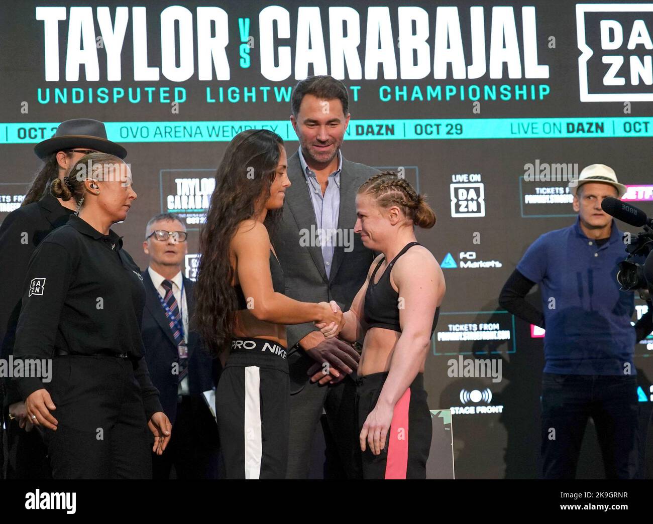 Maisey Rose Courtney (left) and Judit Hachbold during the weigh-in at ...
