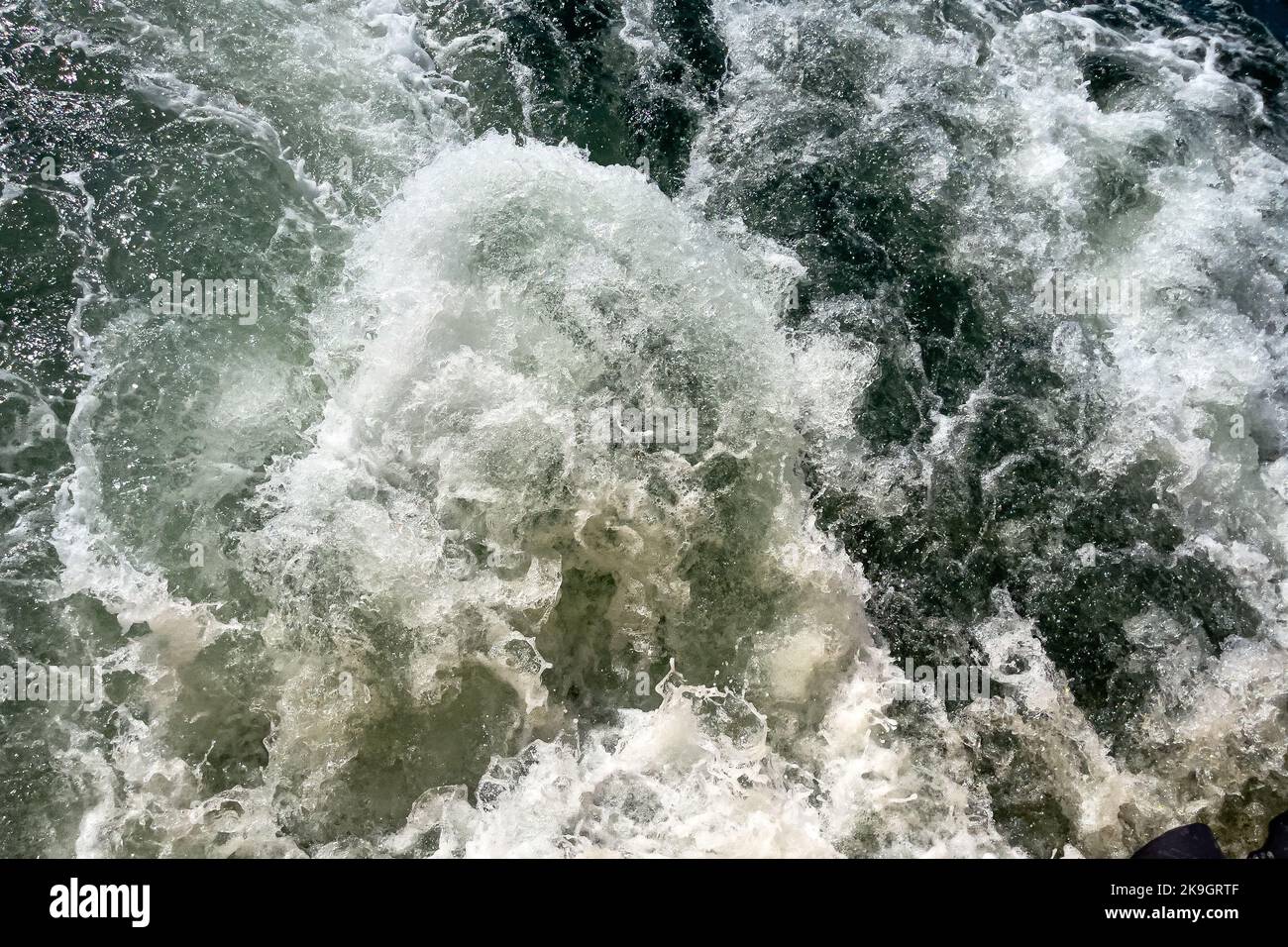 A powerful waves shot from a fast moving boat Stock Photo - Alamy