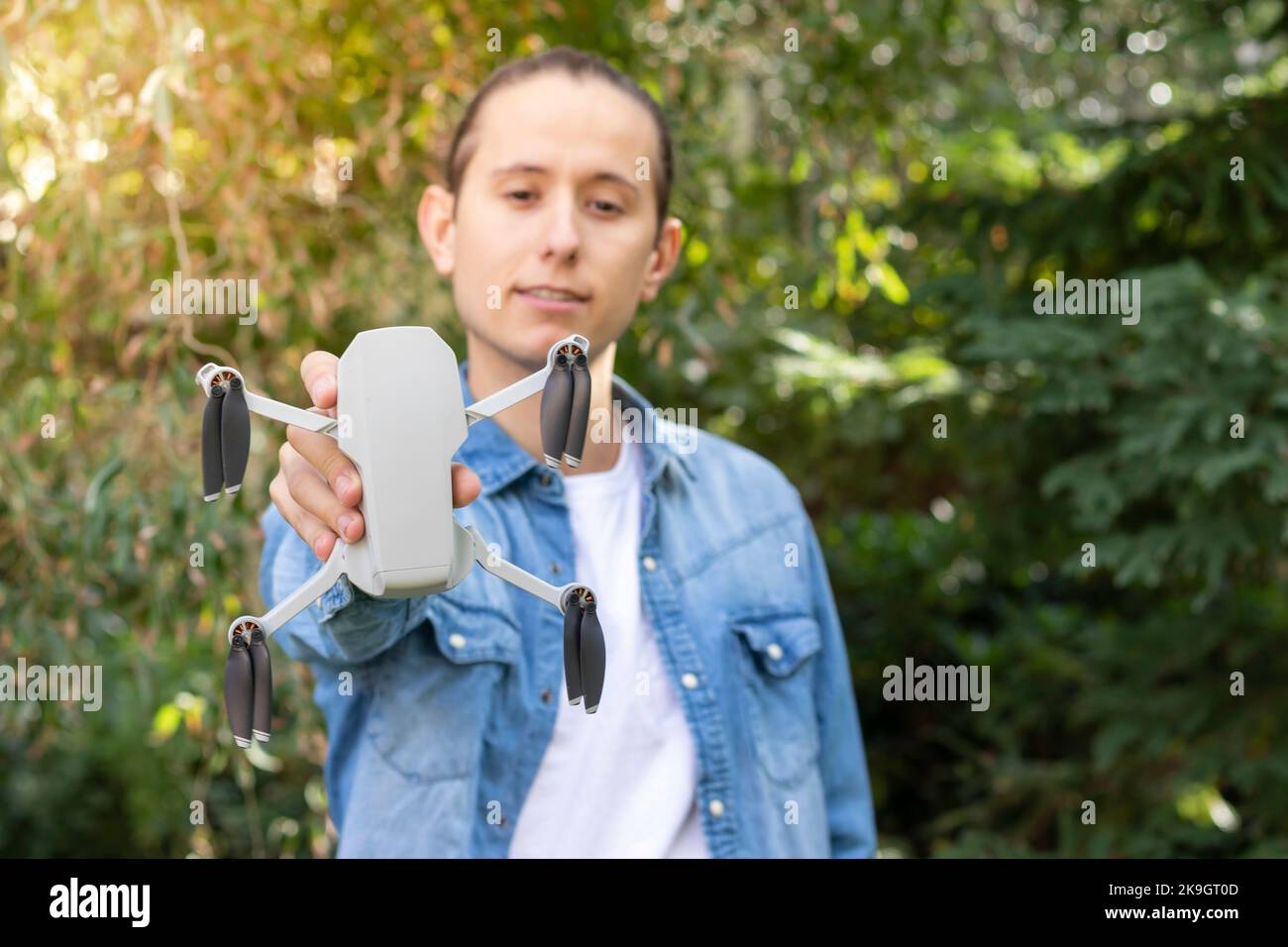 Selective focus portrait of a portable quadricopter drone with 4K ...
