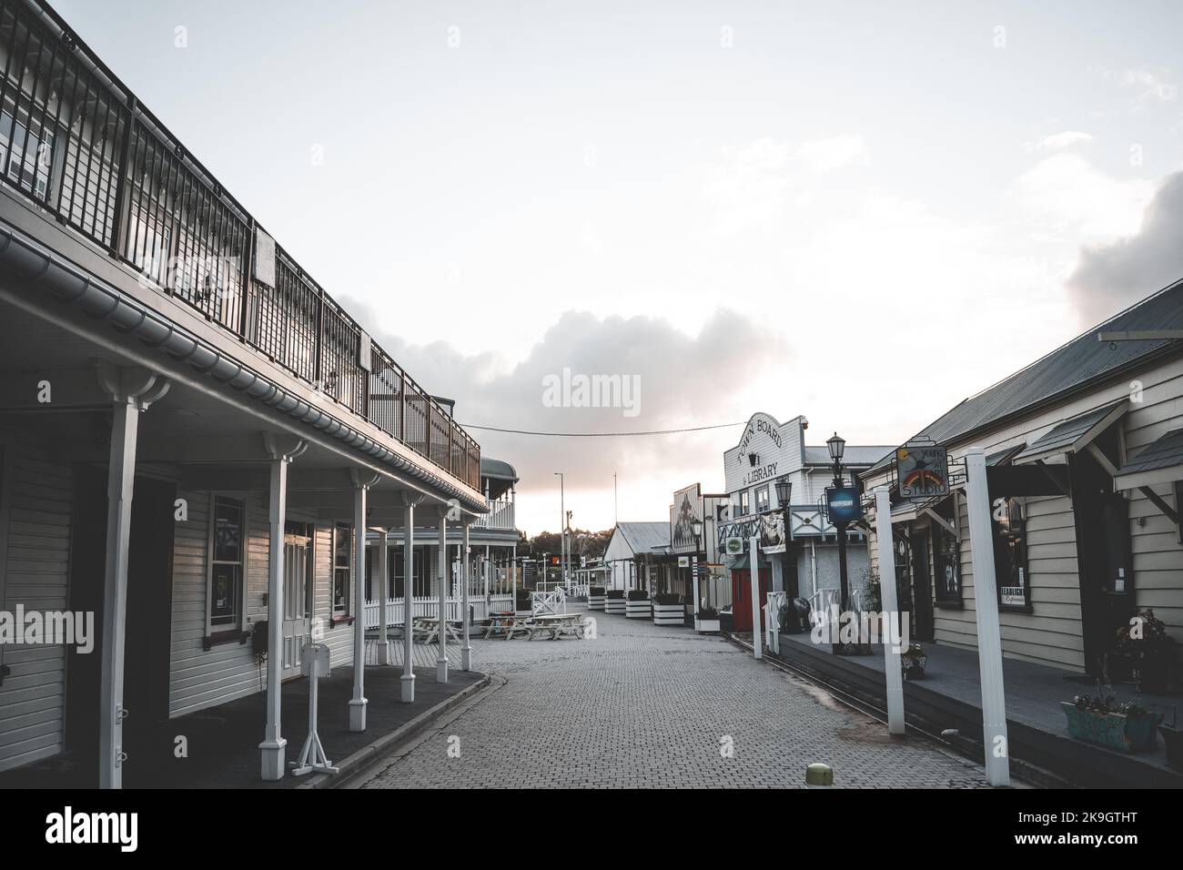 quiet street without people or cars with a stone floor old wooden ...